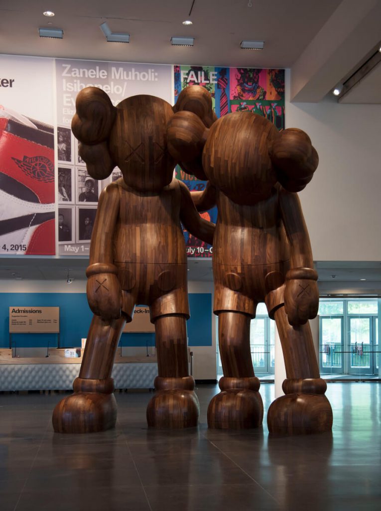 KAWS' 18-Foot-Tall Demented Mickey Mouse Sculptures Take Over the ...