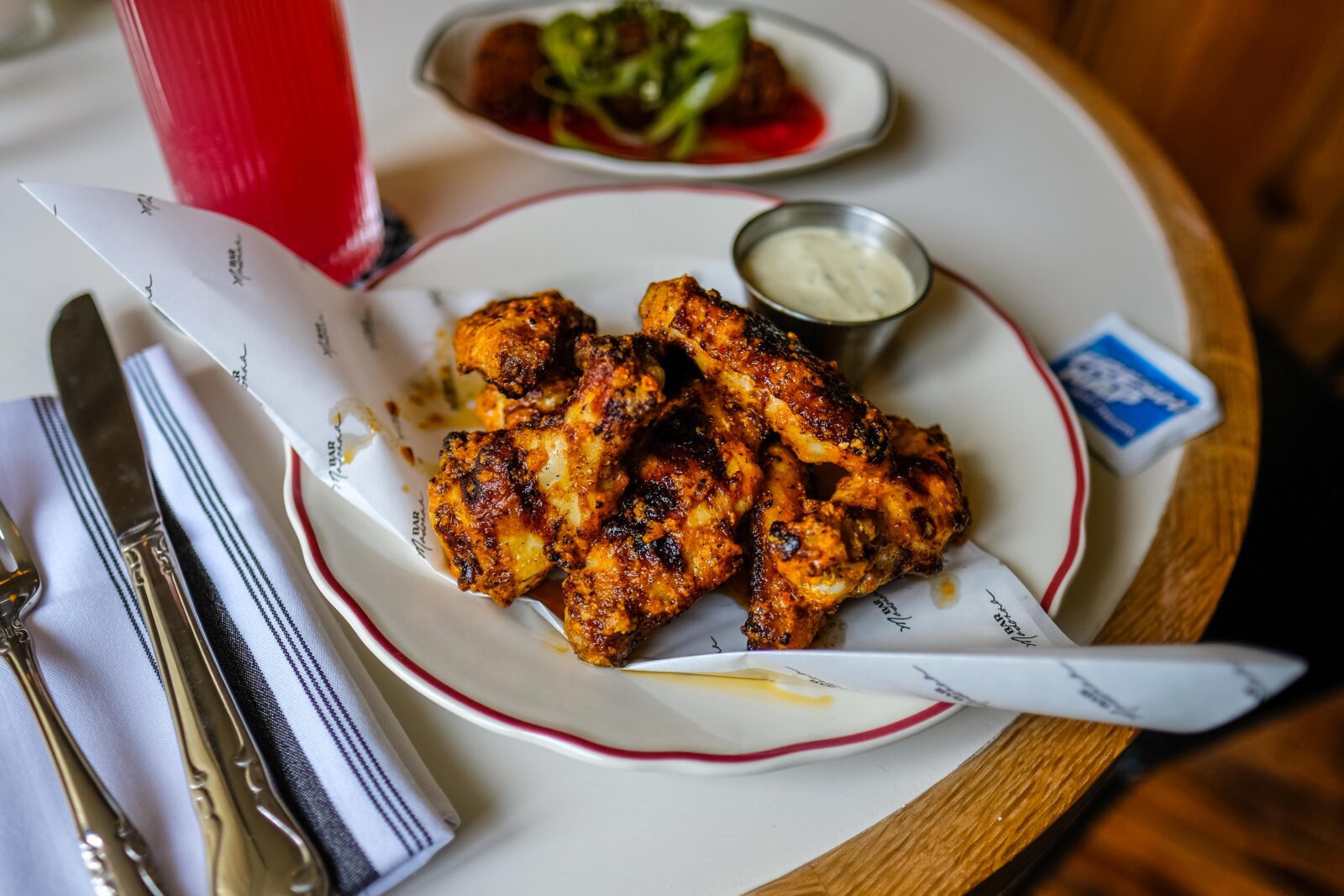 Creative cocktails and a smashed meatball parm star at Bar Madonna in ...