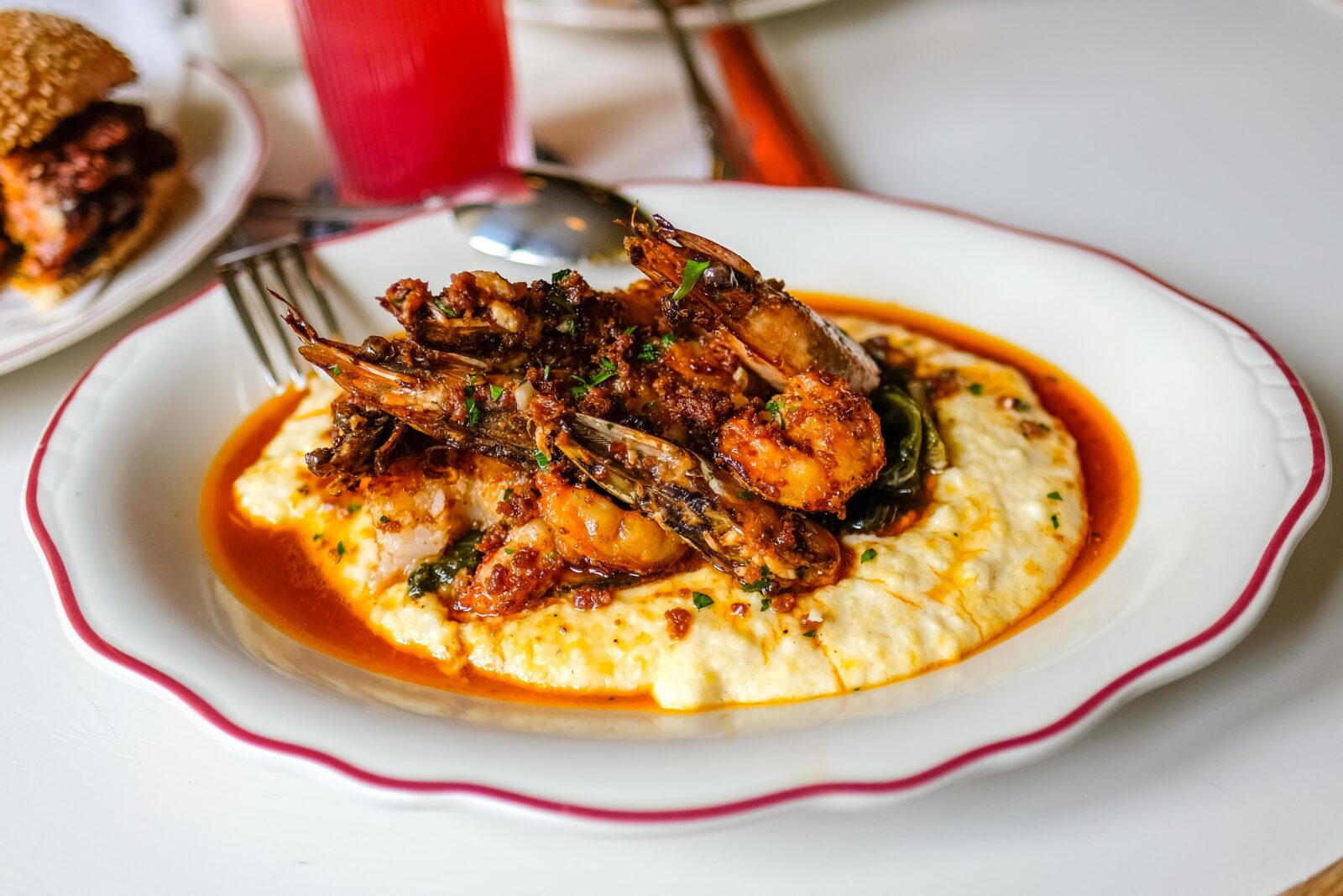 Creative cocktails and a smashed meatball parm star at Bar Madonna in ...